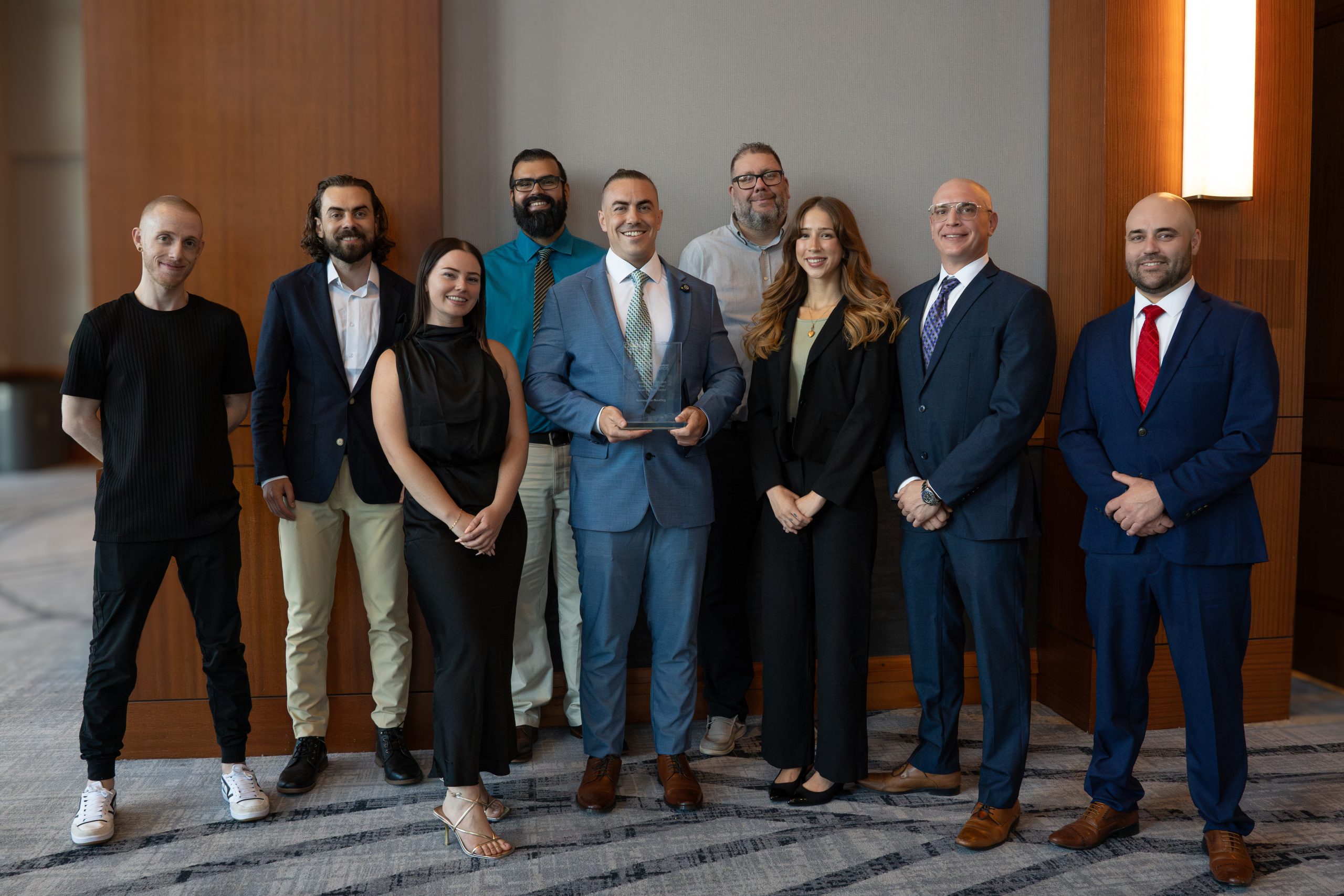 Reimagine Roofing Wins at 2024 Impact Awards - Reimagine Roofing